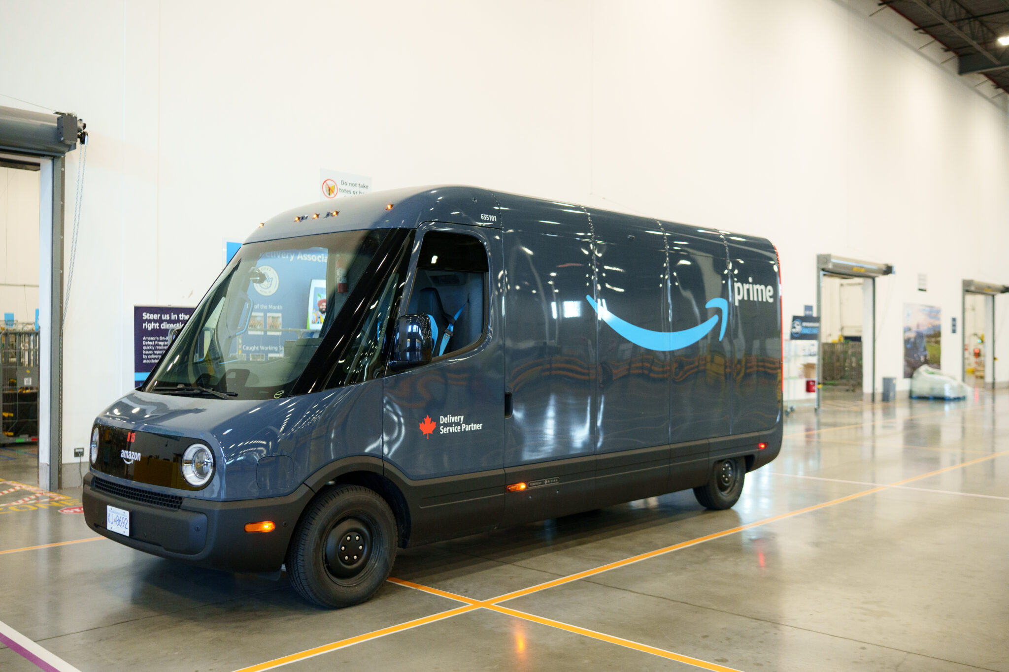 Amazon launches first fleet of electric delivery vans in Canada ...